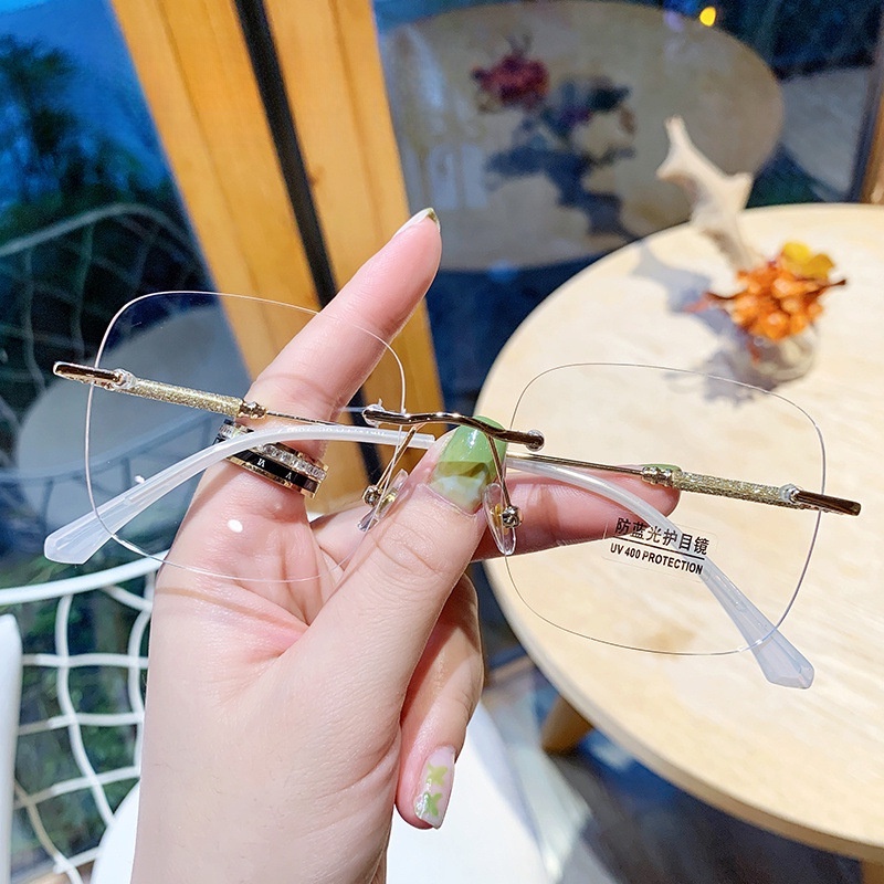 Full star makeup artifact rimless spectacle frame Hombres Y Mujeres ...